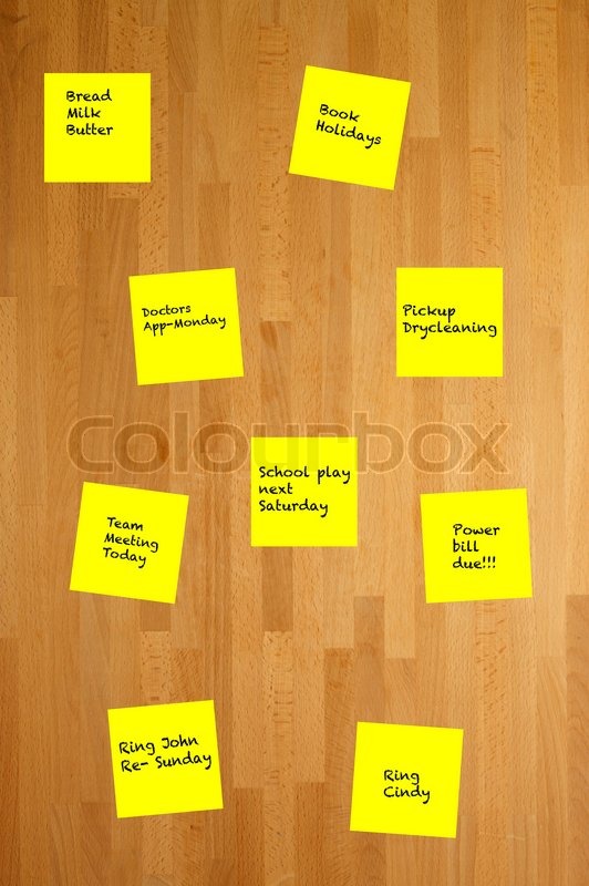Post it notes stuck to a wooden wall | Stock image | Colourbox
