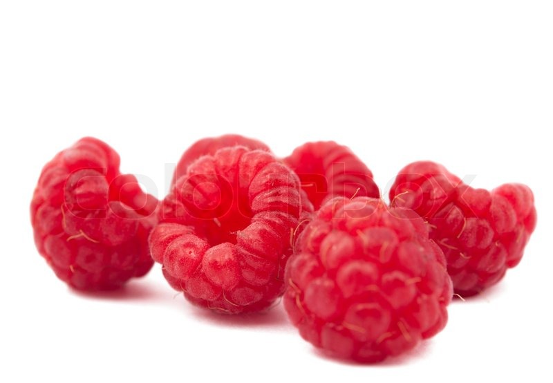 Red raspberries on a white background | Stock Photo | Colourbox