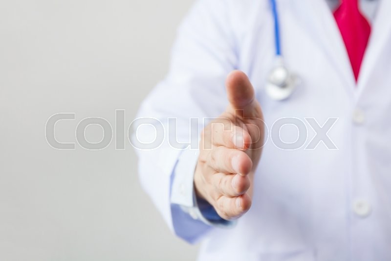 Medical doctor reaching hands out and ... | Stock image | Colourbox