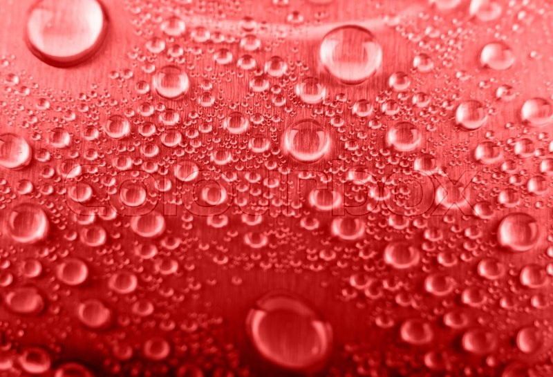 Water drops on a red background closeup | Stock image | Colourbox