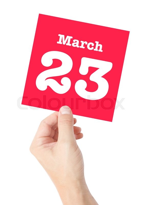 March 23 written on a card held by a ... | Stock image | Colourbox