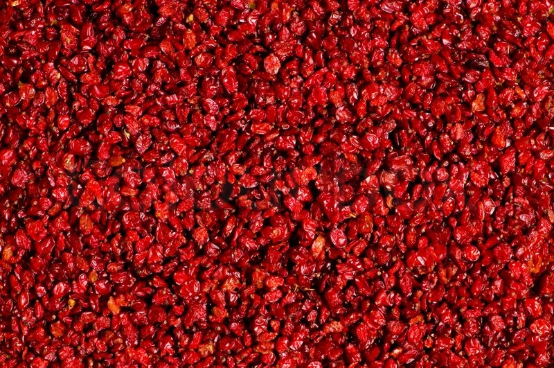 Red raisins isolated on the white ... | Stock image | Colourbox