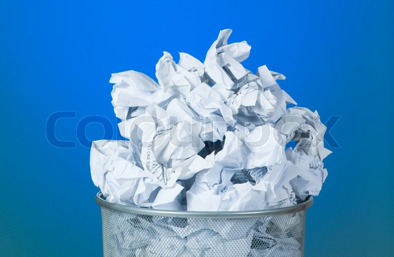 Garbage bin with paper waste against ... | Stock image | Colourbox