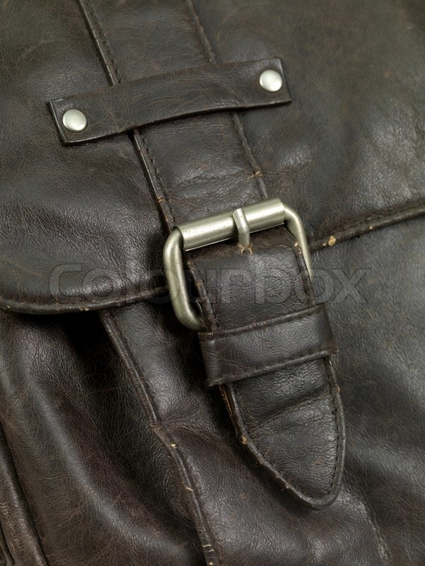 A close up shot of a leather bag buckle | Stock image | Colourbox