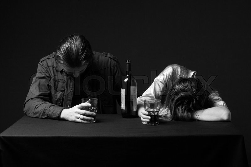 Alcoholism. Abused couple. Drunk ... | Stock image | Colourbox