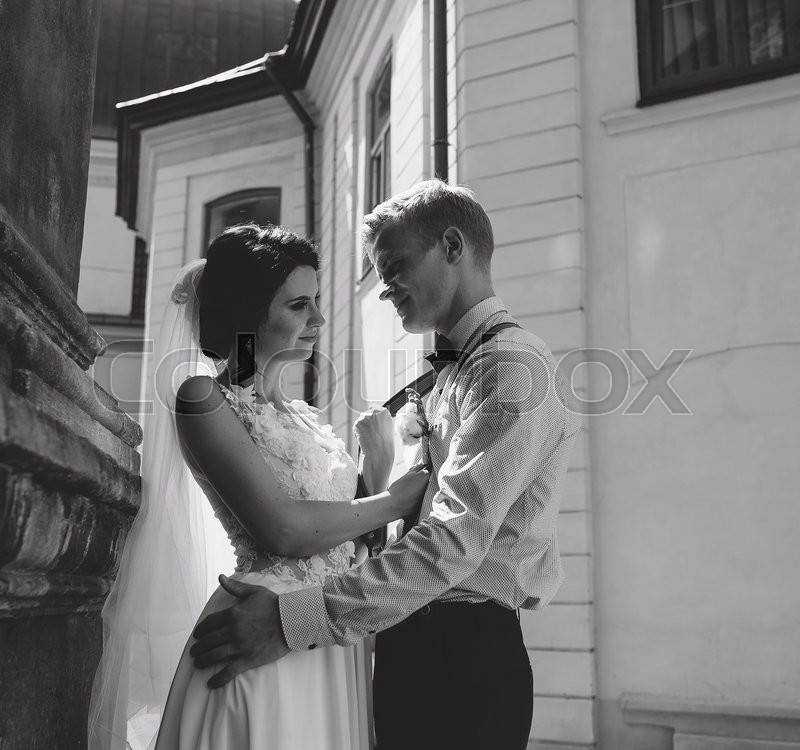 The bride and groom posing in the old ... | Stock image | Colourbox