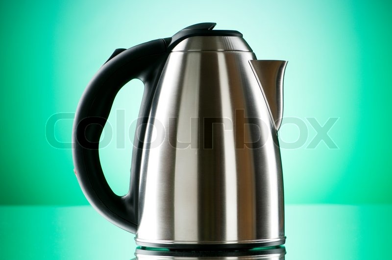 Shiny kettle against the colorful ... | Stock image | Colourbox