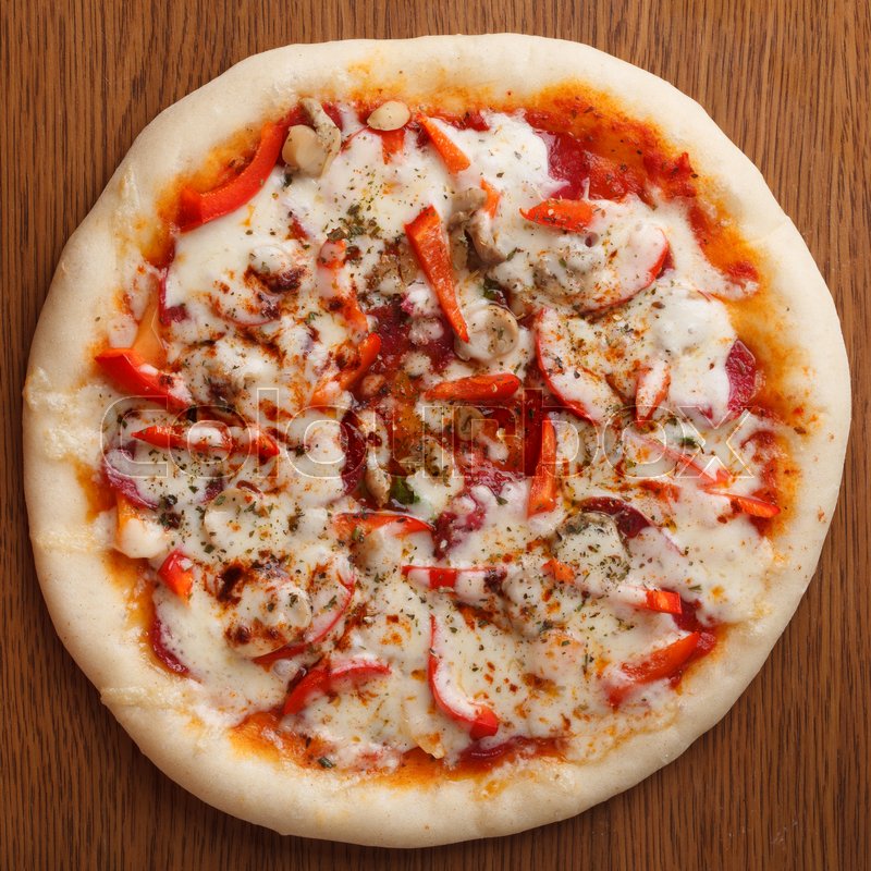 Tasty Italian pizza with cheese and ... | Stock image | Colourbox