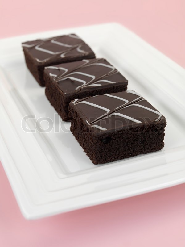 Chocolate mud cake slices isolated ... | Stock image | Colourbox