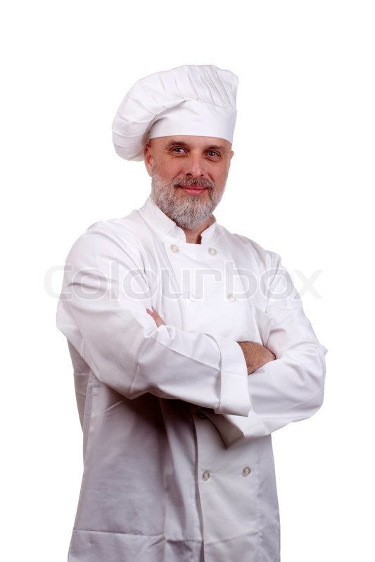 Portrait of a happy chef in a chef's ... | Stock image | Colourbox