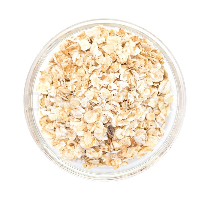 Oatmeal in a glass bowl isolated on ... | Stock image | Colourbox