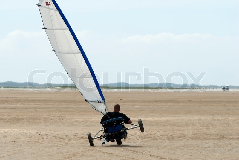 Land sailing on two wheels on the beach ... | Stock image | Colourbox