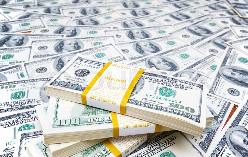 Stak af dollars på penge baggrund | Stock foto | Colourbox