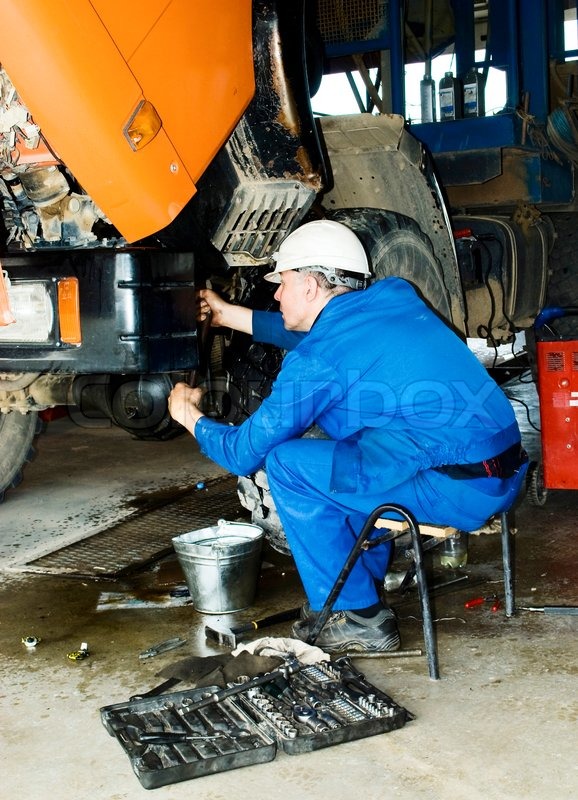 Worker repair the truck | Stock image | Colourbox
