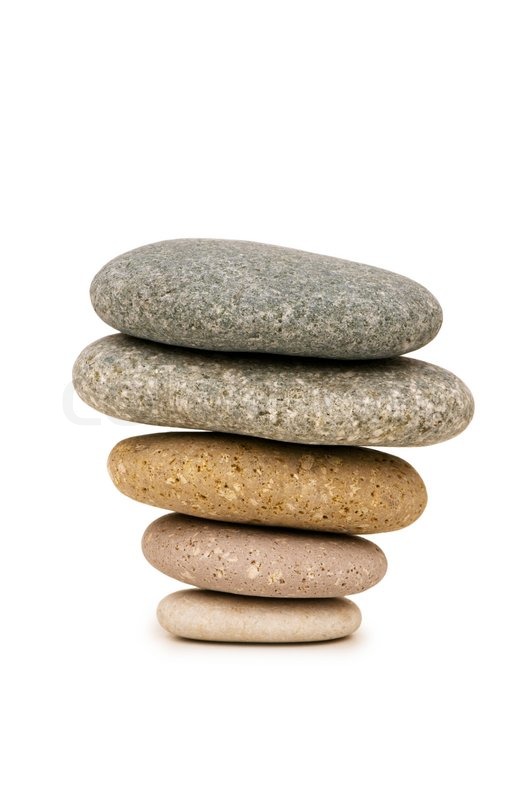 Stack of pebbles isolated on the white ... | Stock image | Colourbox