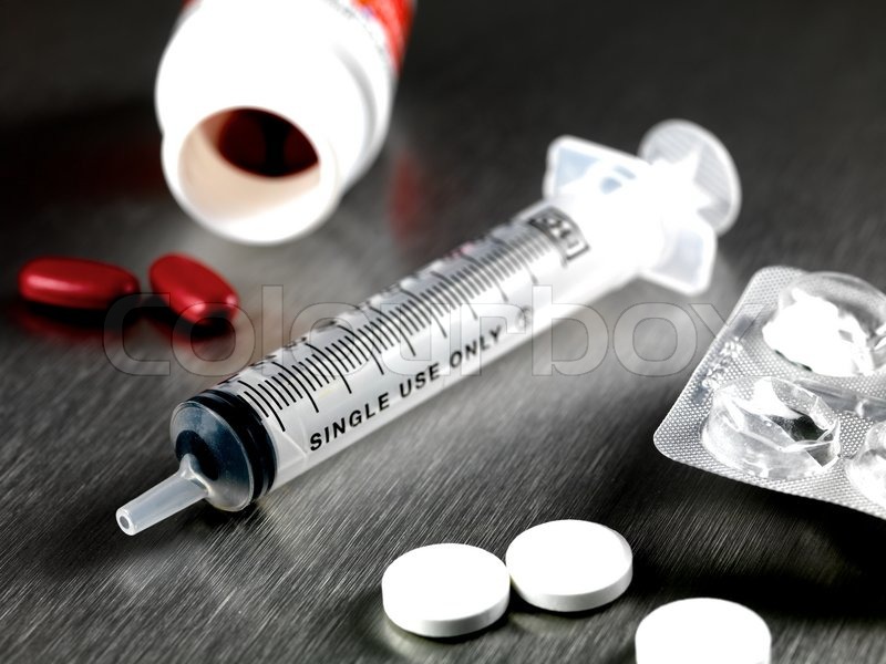 Assorted medication equipment on a ... | Stock image | Colourbox