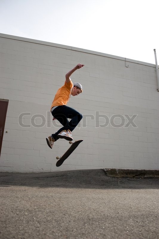 Portrait of a young skateboarder ... | Stock image | Colourbox