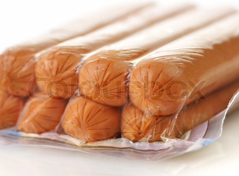 Sausages in a plastic package on a ... | Stock image | Colourbox