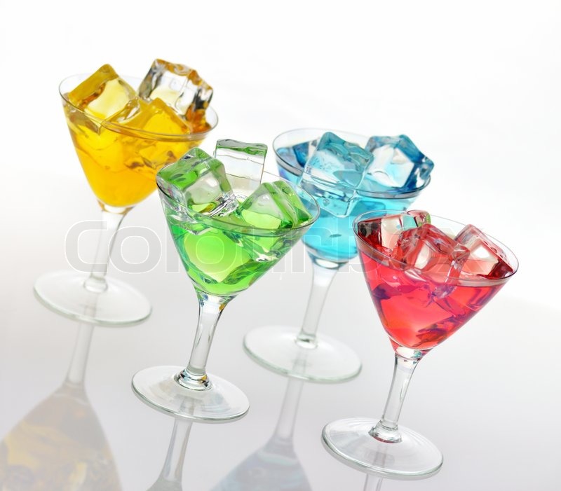 Glasses of colorful drinks with ice ... | Stock image | Colourbox