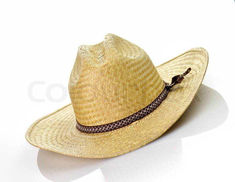 A vintage straw hat on white background | Stock image | Colourbox