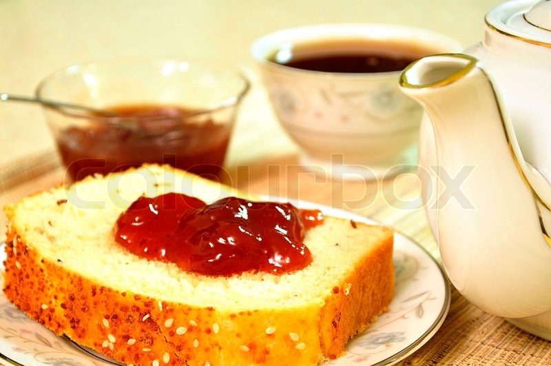 Tea and bread with jelly , close up ... | Stock image | Colourbox