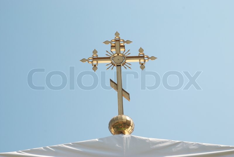 Golden orthodox cross with blue sky ... | Stock image | Colourbox