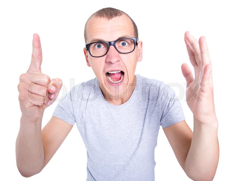 Funny and angry young man in glasses ... | Stock image | Colourbox