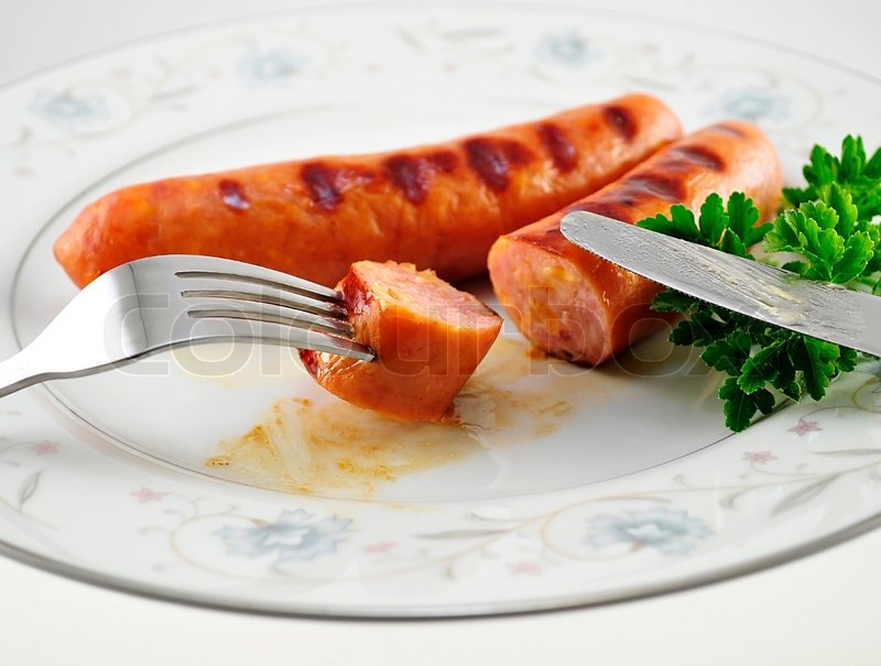 Gegrillten Käse Wurst mit Messer und ... | Stock Bild | Colourbox