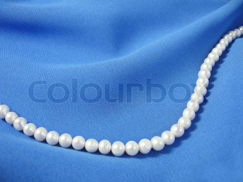 Beautiful white pearls on background ... | Stock image | Colourbox