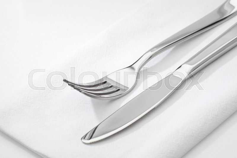 Close up view of nice steel fork and ... | Stock image | Colourbox