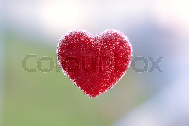 Red heart with bubbles floating in the ... | Stock Photo | Colourbox