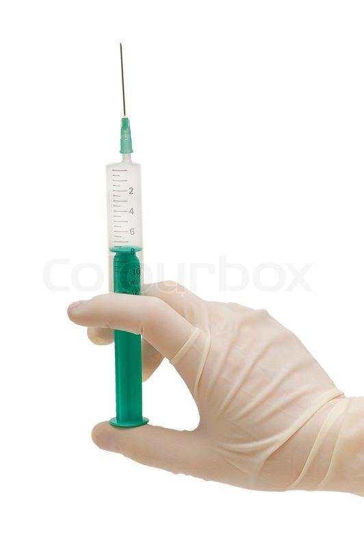 Hand holding syringe isolated on the ... | Stock image | Colourbox
