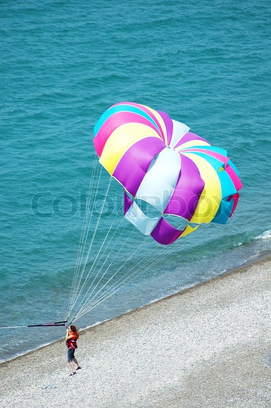 Multi coloured parachute over the blue ... | Stock image | Colourbox
