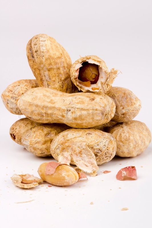 Pile of peanuts isolated on a white ... | Stock image | Colourbox