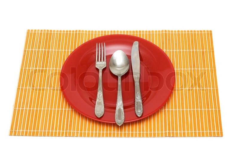 Set of table utensils in the plate ... | Stock image | Colourbox