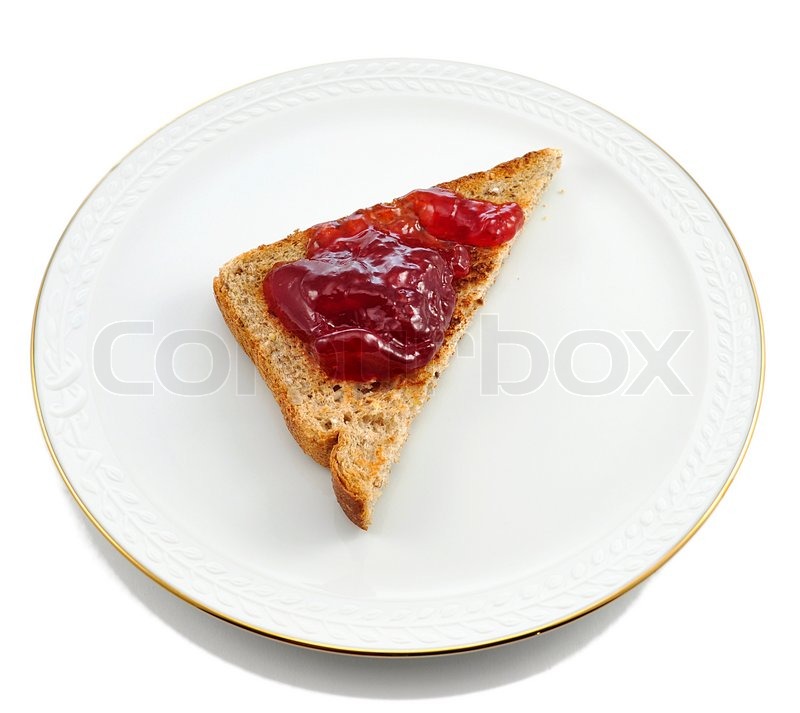A toast with jam on a plate | Stock image | Colourbox
