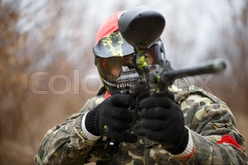 Paintball sport player wearing ... | Stock image | Colourbox