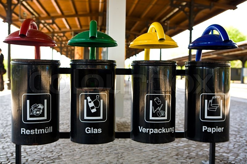 Color coded trash bins for waste segregation | Stock Photo | Colourbox