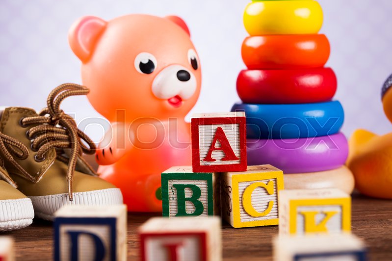 Children's of toy accessories on wooden ... | Stock image | Colourbox