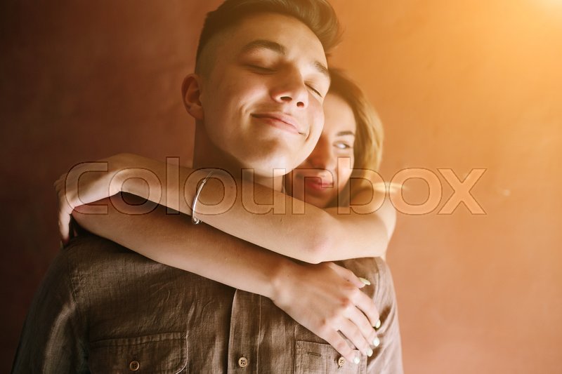 Girl Hugging Boy From Back