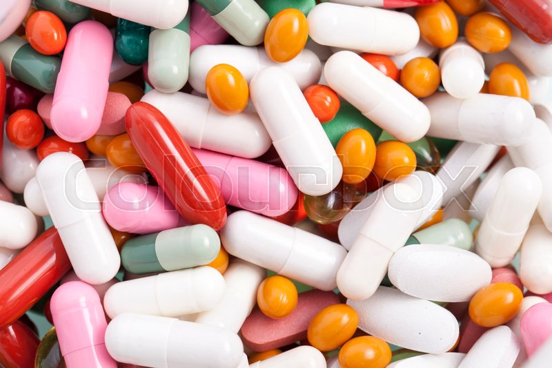 Set of capsules on white background. ... | Stock image | Colourbox