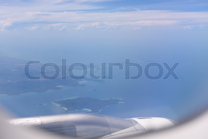 Aerial view from jet plane blue sky and ... | Stock image | Colourbox