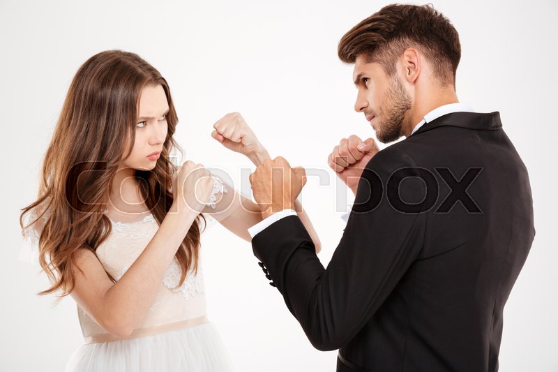 Couple fighting. white background | Stock image | Colourbox