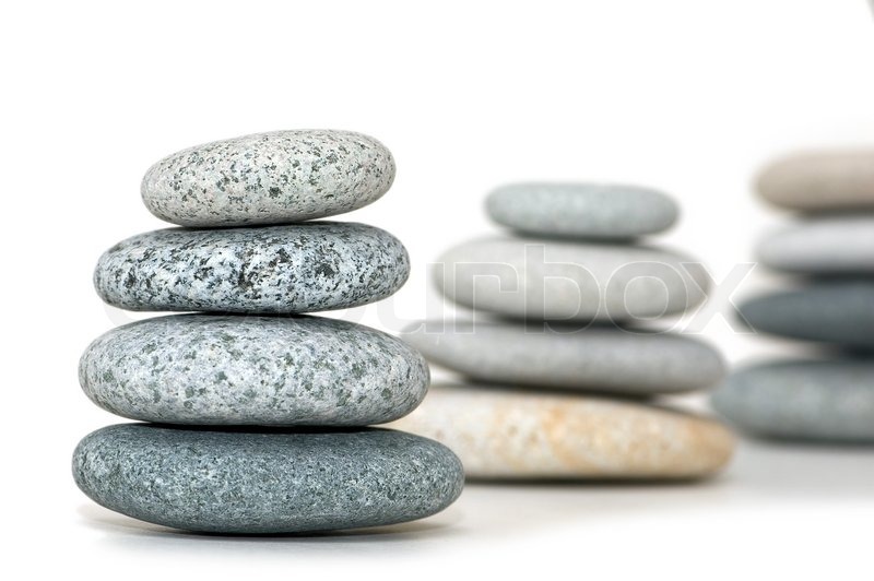 Stapel von Kieselsteinen isoliert auf ... | Stock Bild | Colourbox