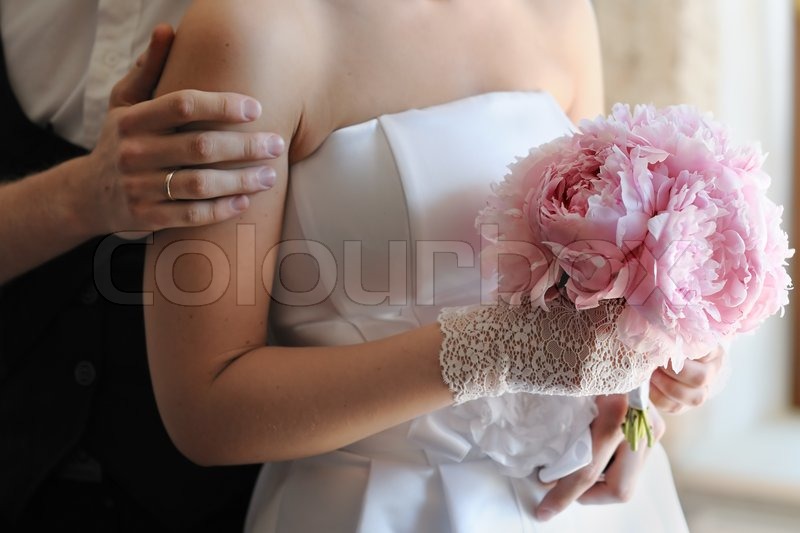 Bride holding beautiful wedding ... | Stock image | Colourbox