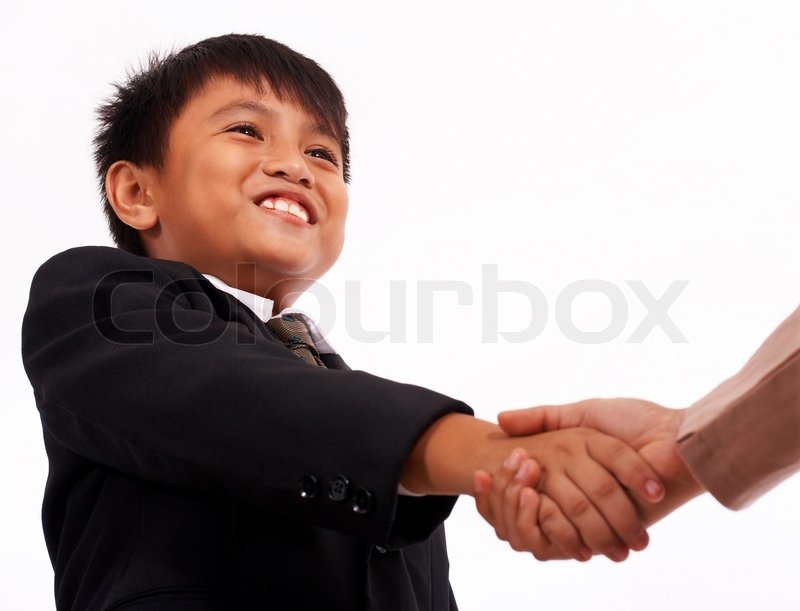 Boy In A Formal Suit Shaking Hands With ... | Stock image | Colourbox