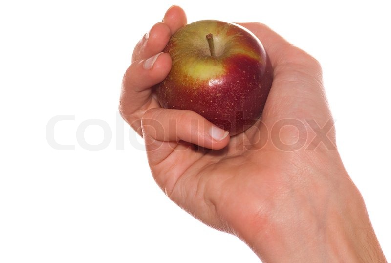 Man Hand hält einen Apfel isoliert auf ... | Stock Bild | Colourbox