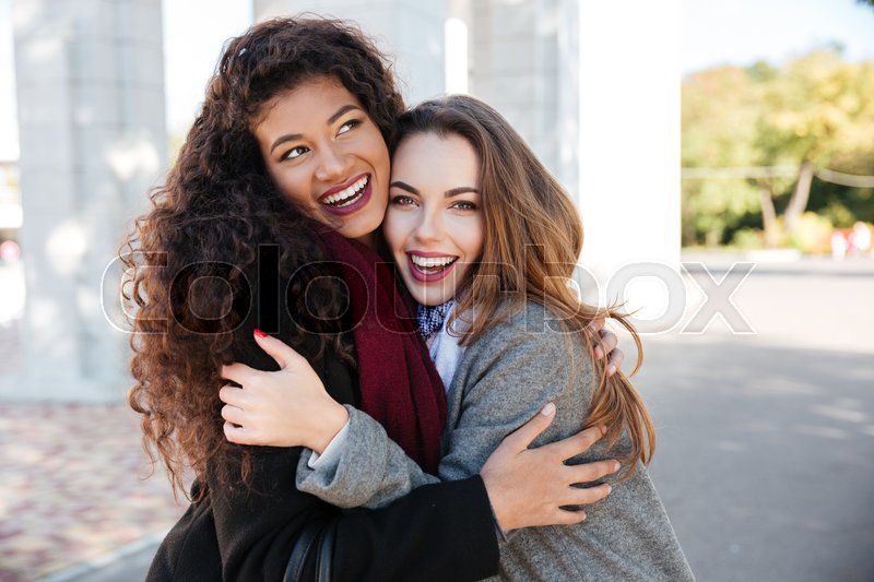 Picture of happy meeting of two friends ... | Stock image | Colourbox