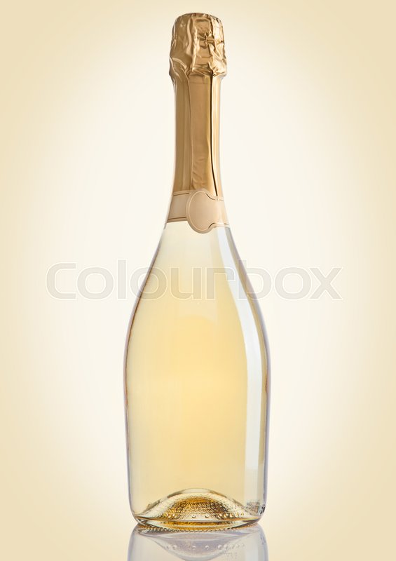 Bottle of champagne golden yellow color ... | Stock image | Colourbox