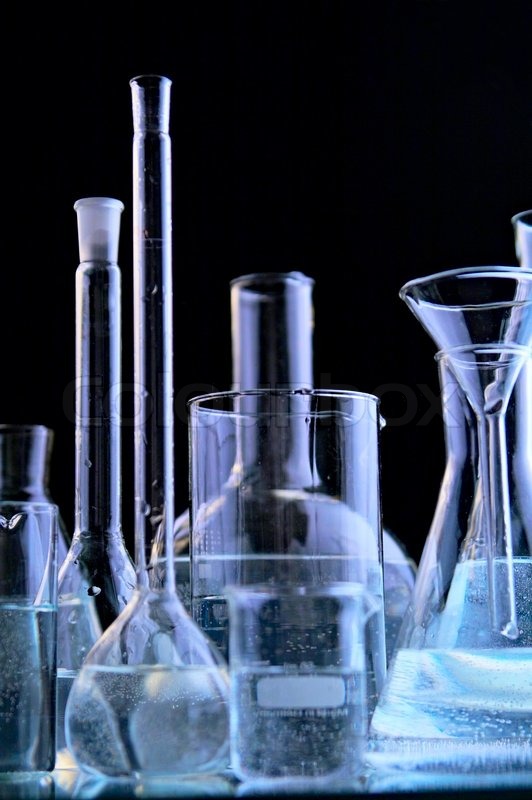 Glass flasks for chemical laboratory on black background | Stock Photo ...